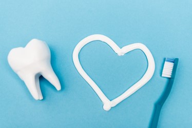 Protect Your Heart with a Healthy Smile | Dr. Jeff Yenzer